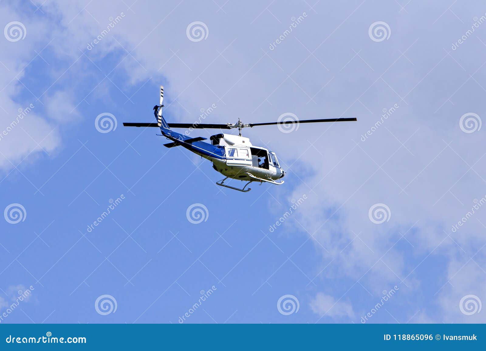 Blue helicopter in the sky stock photo. Image of speed - 118865096