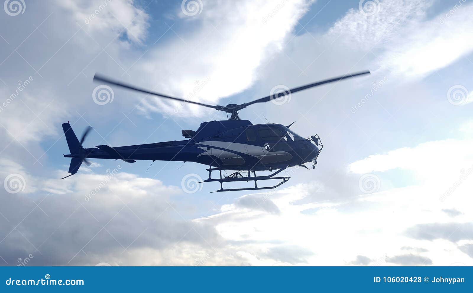 Blue helicopter flying stock photo. Image of pilot, aerial - 106020428