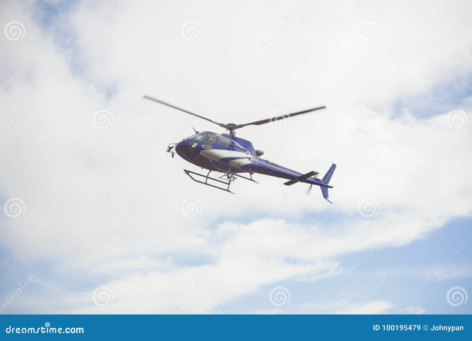 Blue helicopter in air stock image. Image of search - 100195479