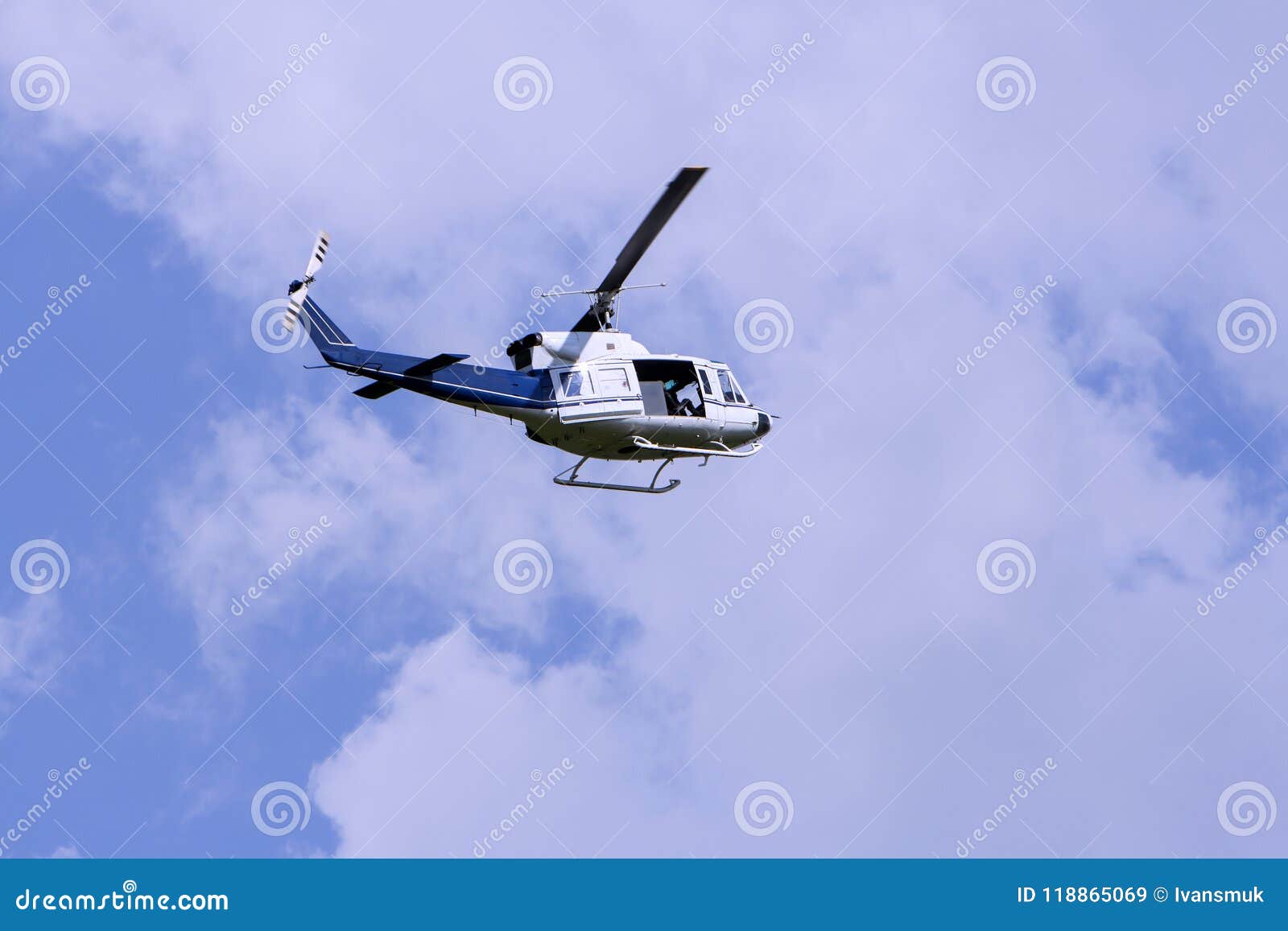 Blue helicopter in the sky stock image. Image of apache - 118865069