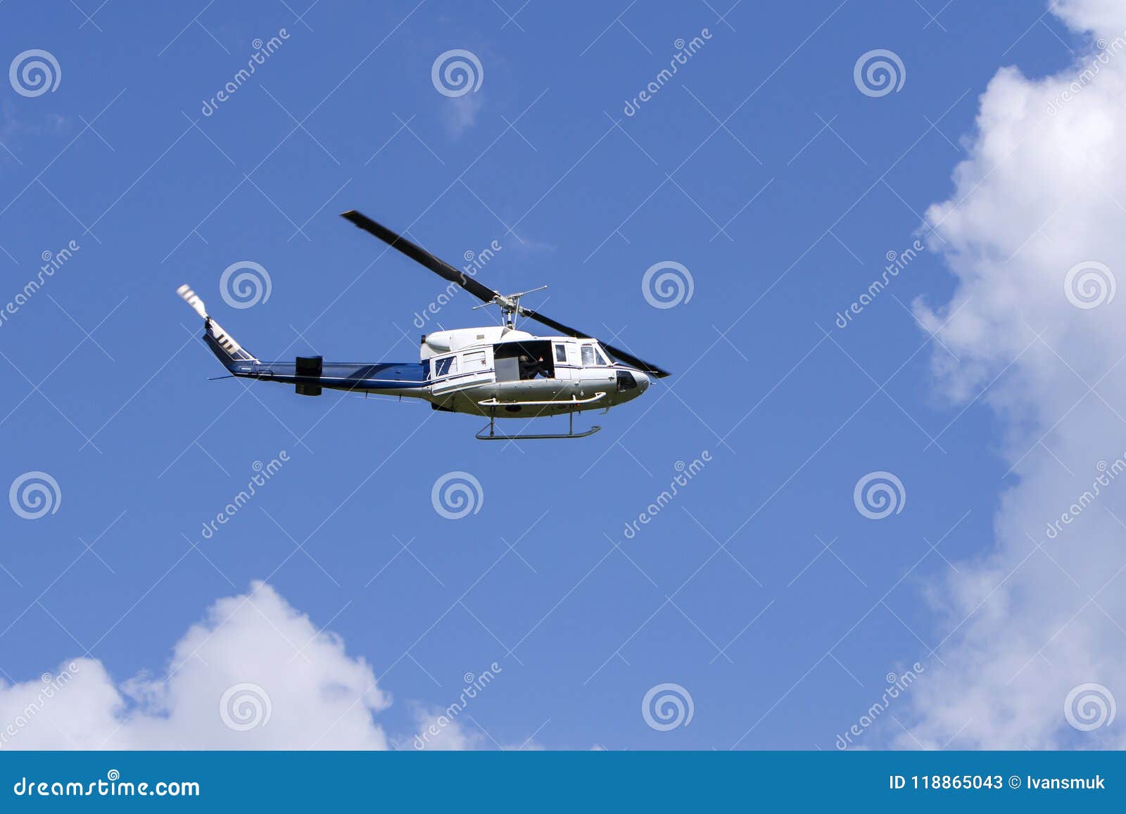 Blue helicopter in the sky stock image. Image of outdoors - 118865043