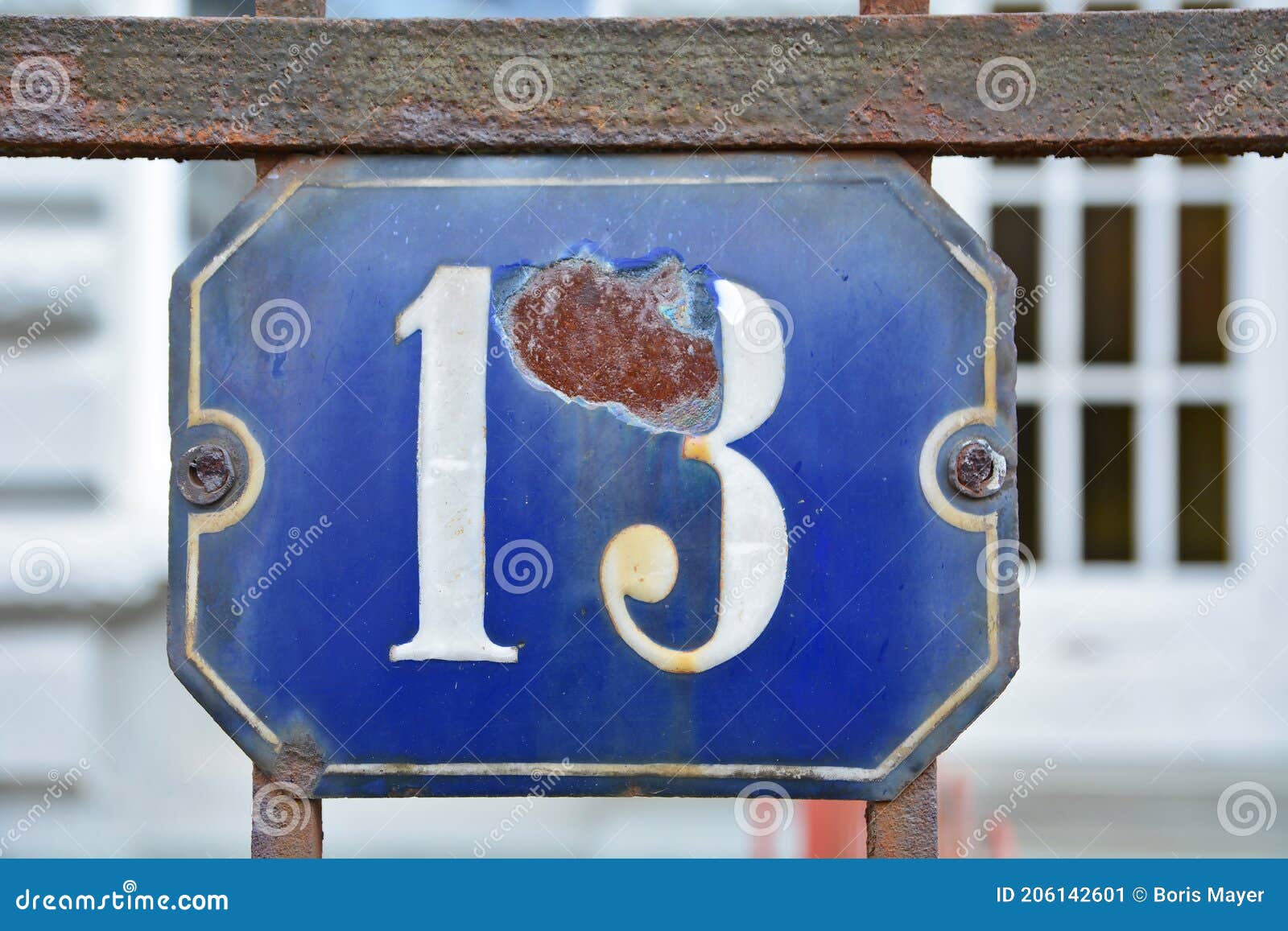 A Blue House Number Plaque, Showing the Number Thirteen Stock Image ...