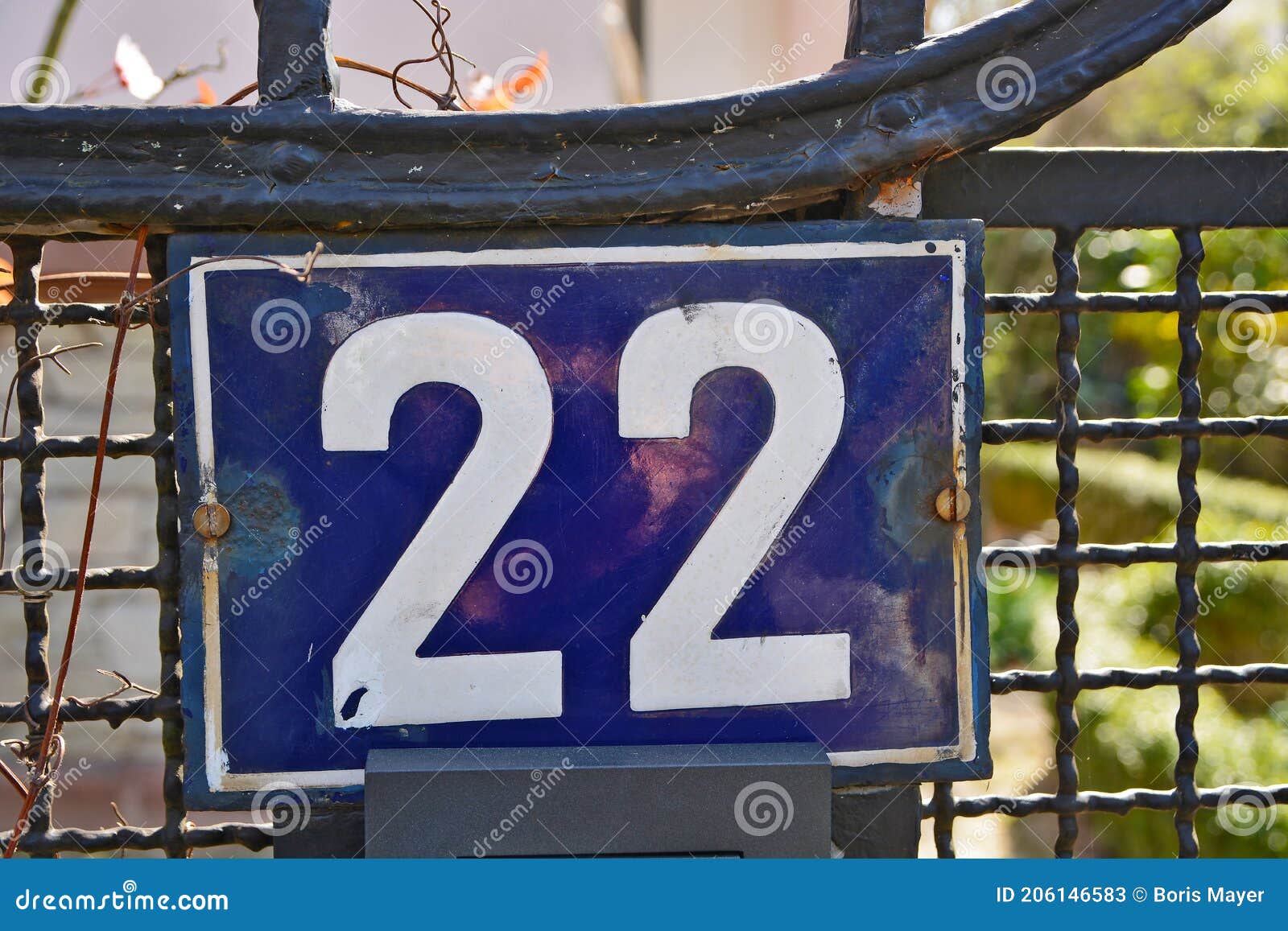 A Blue House Number Plaque, Showing the Number Twenty Two Stock Image ...