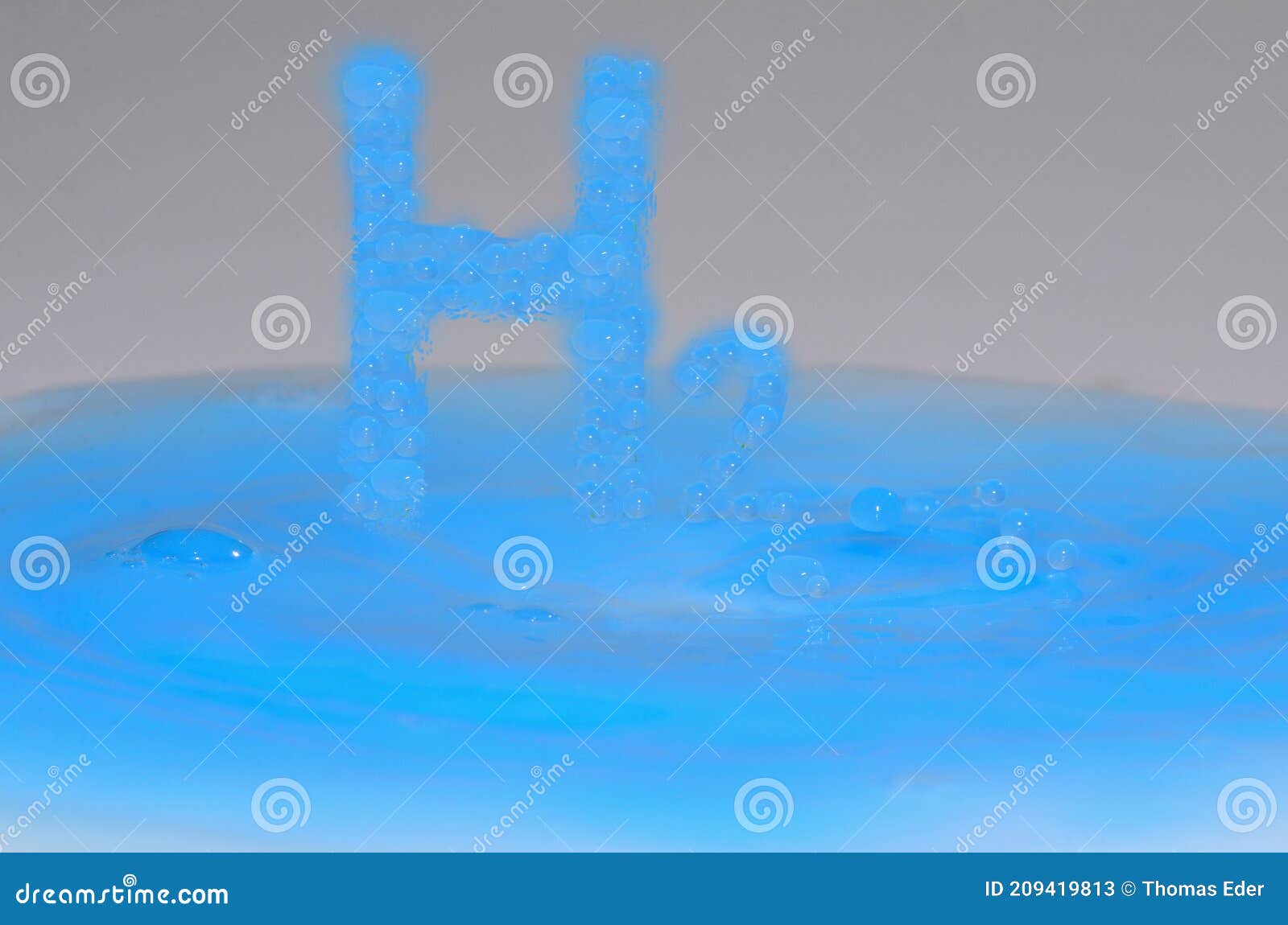 Blue Hydrogen H2 Letters Over Blue Liquid with Drops Stock Illustration ...