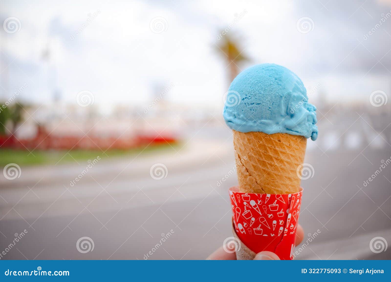 Blue Ice Cream Cone with Blurred Background Stock Image - Image of ...