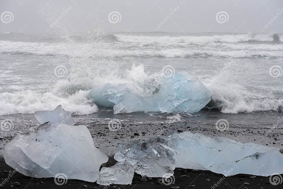 Blue Ice at the Diamond Beach in Iceland Stock Image - Image of glacial ...