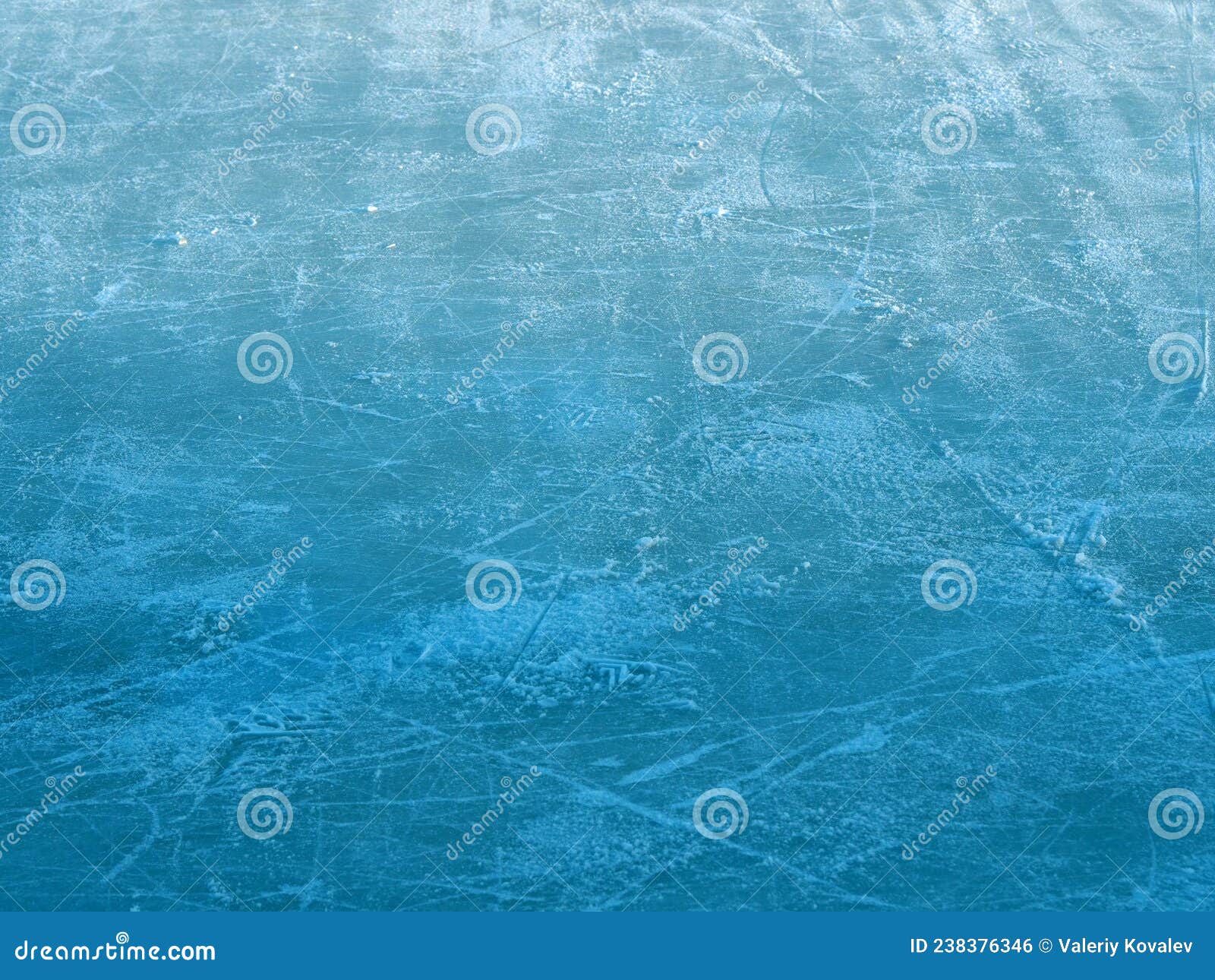 Blue ice with skate marks. stock photo. Image of winter - 238376346