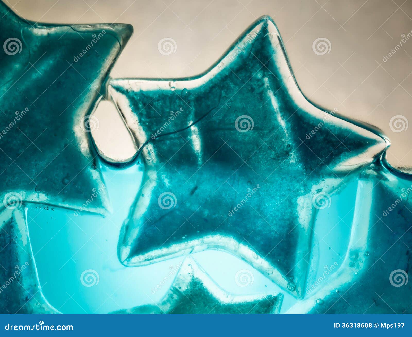 Blue ice star in water stock photo. Image of melting - 36318608