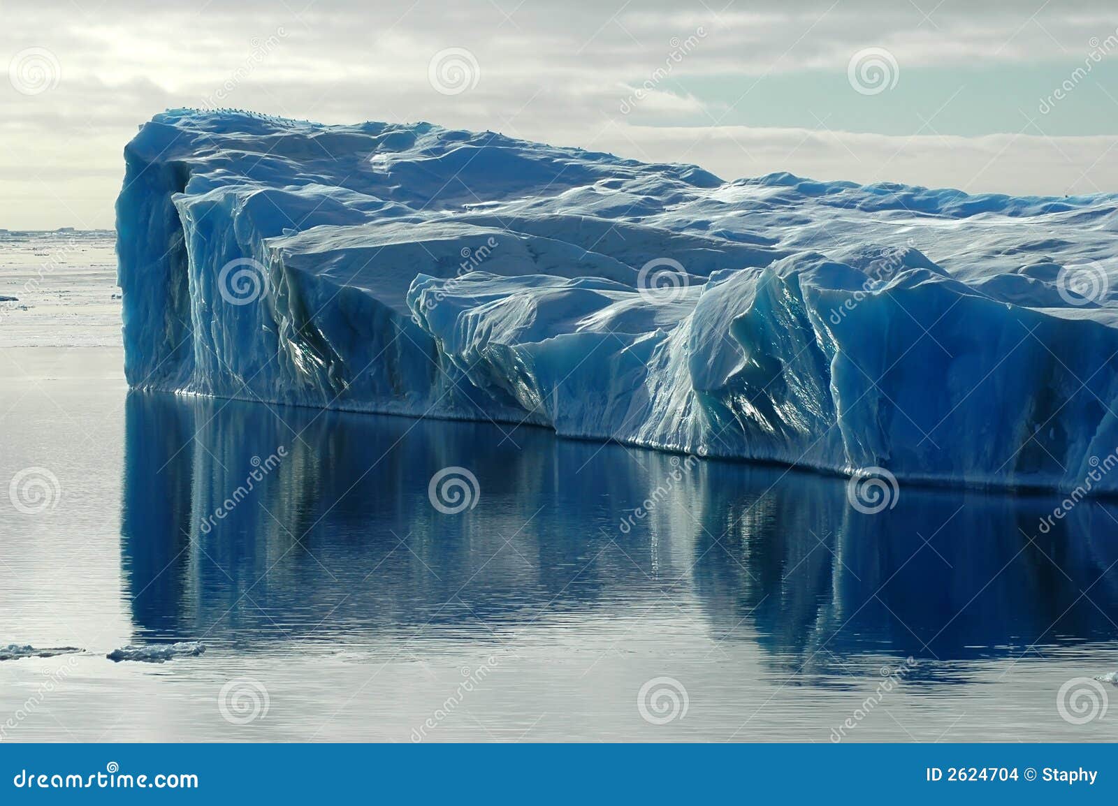 Blue Iceberg with Reflection Stock Photo - Image of ecotourism, cold ...