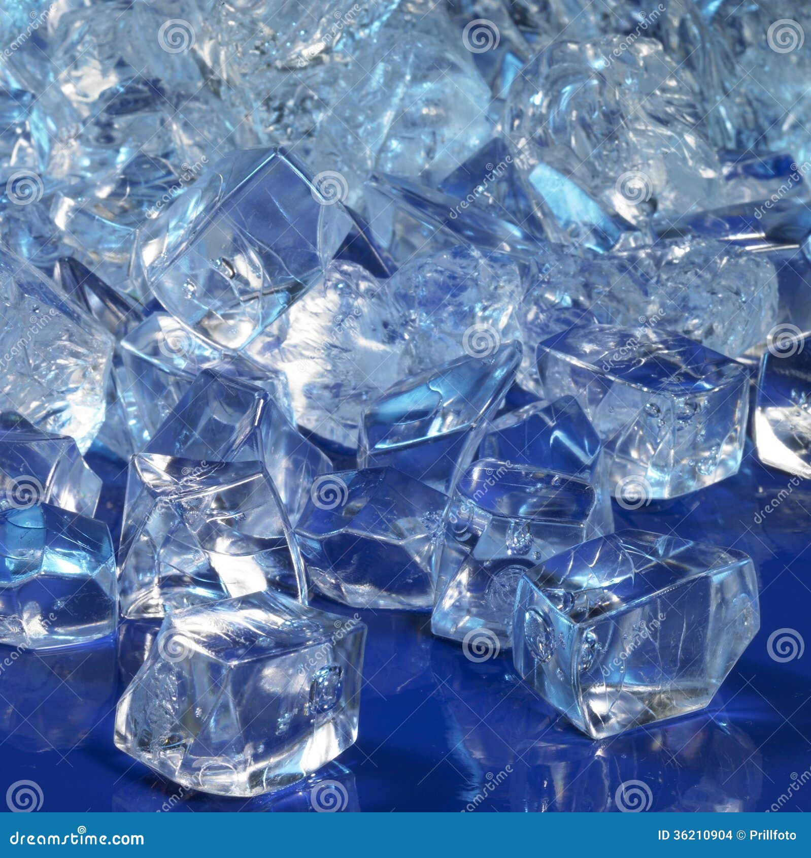 Blue illuminated ice cubes stock photo. Image of shiny - 36210904