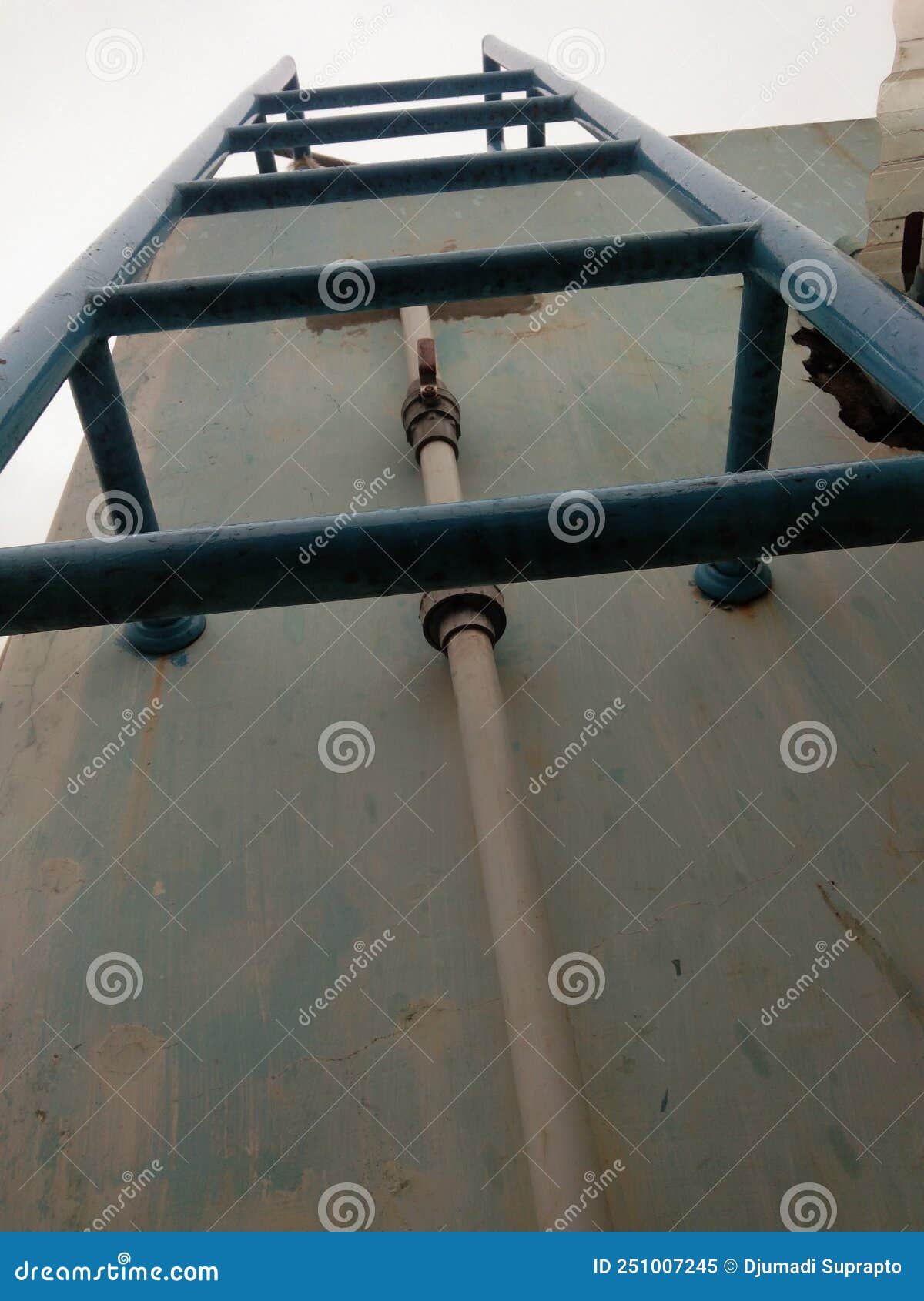 Blue Iron Ladder To the Water Tower Stock Image - Image of blue, ladder ...