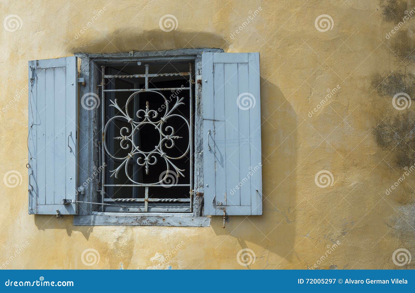 Blue Iron Window on a Worn Stucco Wall. Stock Image - Image of pattern ...