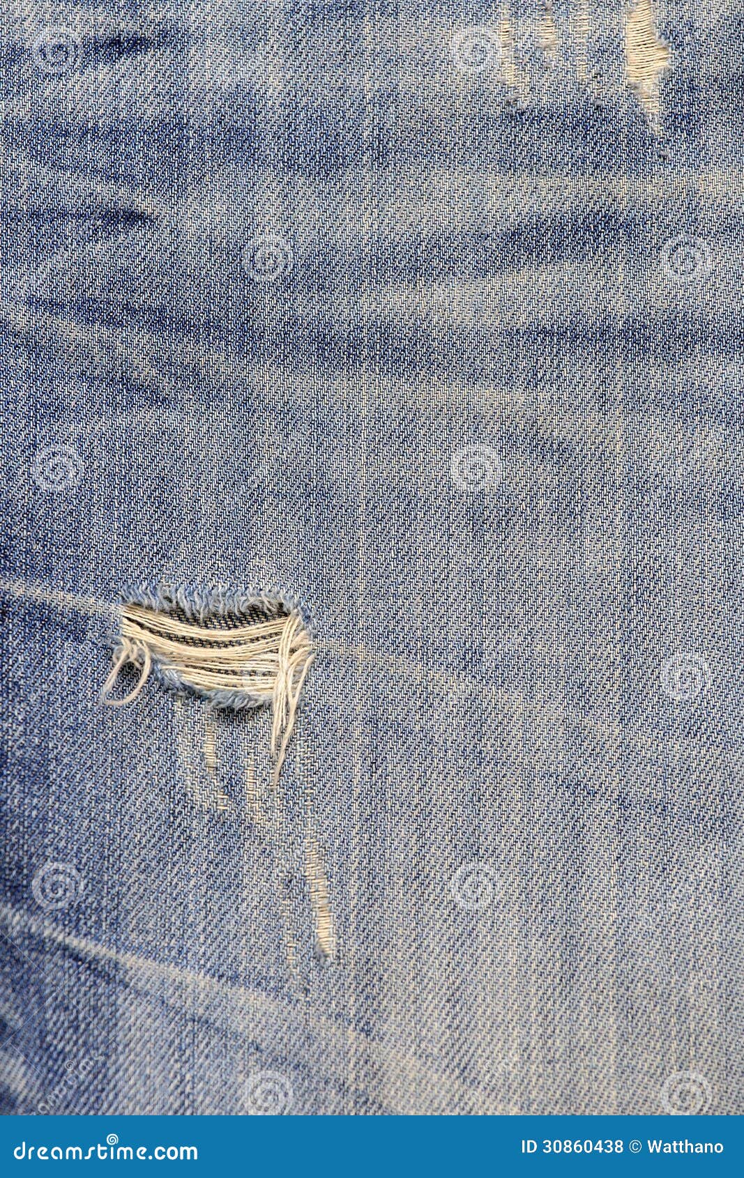 Blue Jean Texture with a Hole and Threads Showing Stock Photo - Image ...