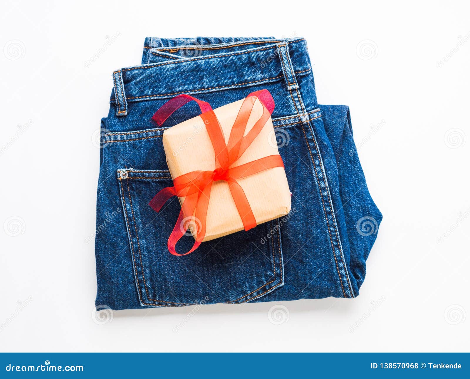 Blue Jeans and Gift Box on White Background Stock Photo - Image of ...