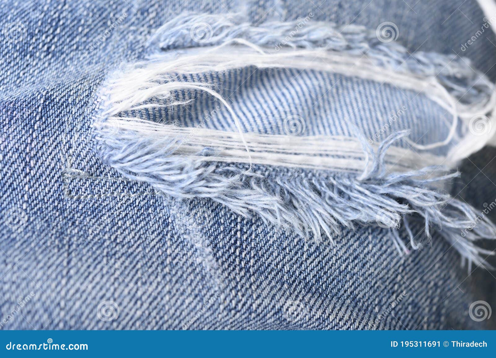 Blue Jeans with Holes and White Threads Stock Image - Image of jeans ...