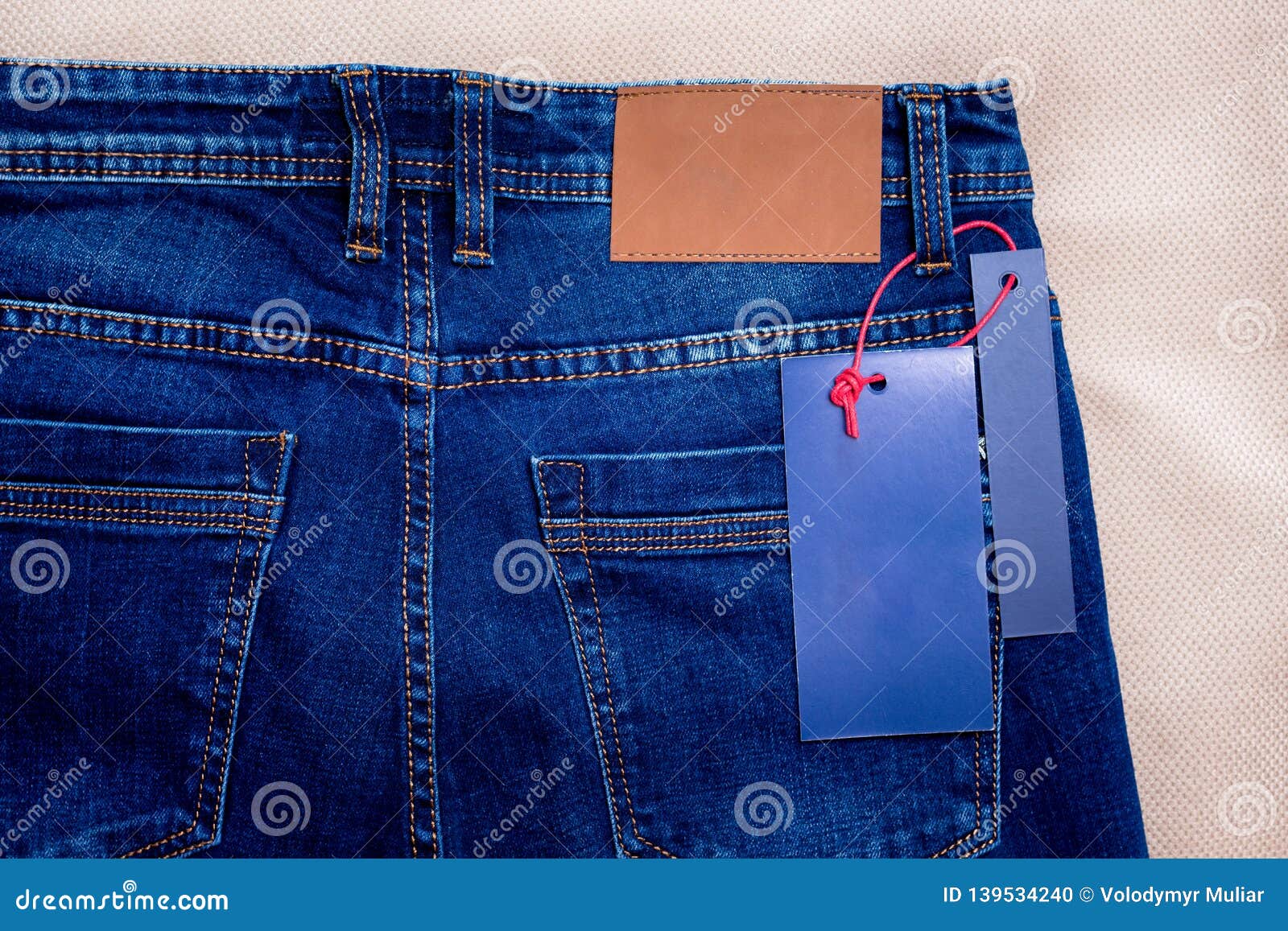 Blue Jeans with Labels. Sewing and Selling Jeans_ Stock Photo - Image ...
