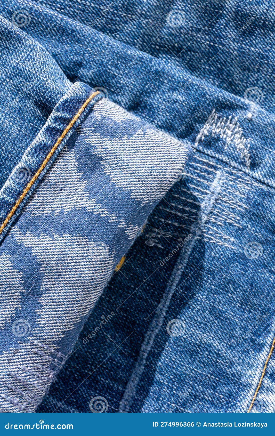 Blue Jeans with Patterns on the Cuffs and Decorative Seams Close Up ...