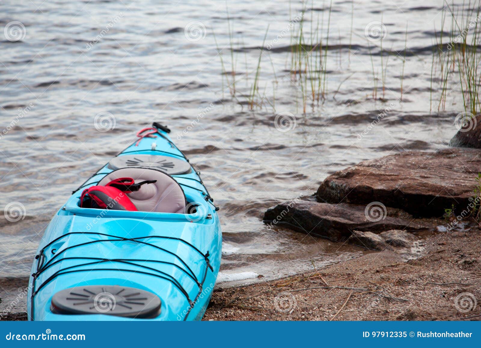 Blue kayak in the lake stock image. Image of peaceful - 97912335