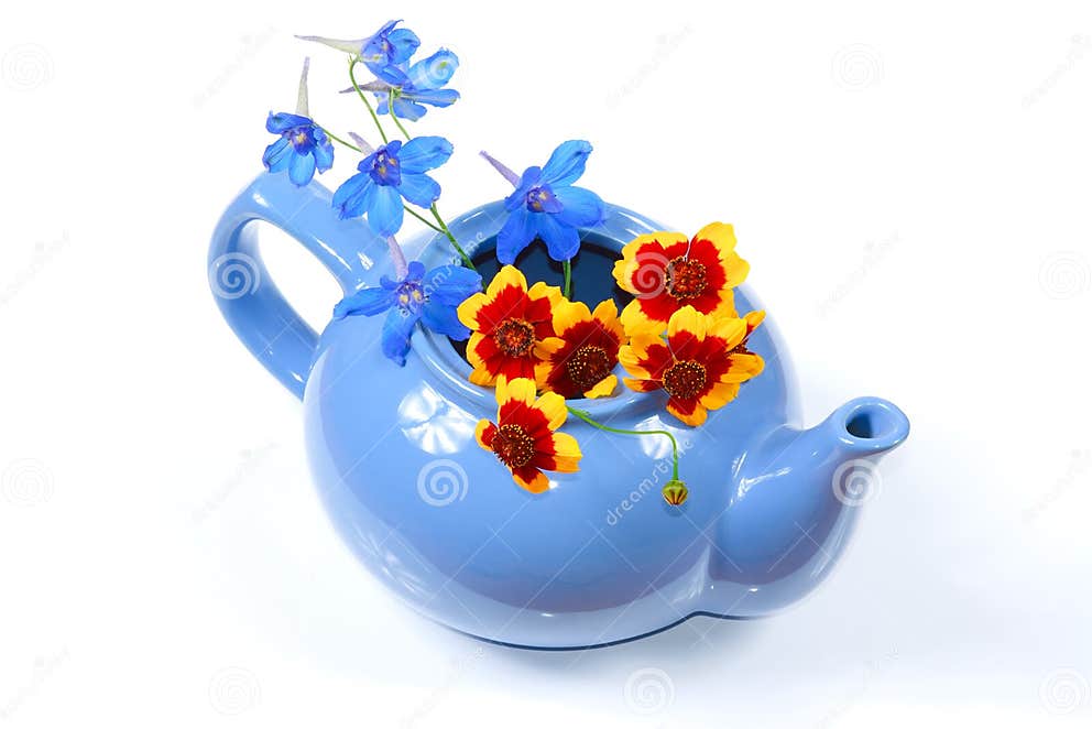 The Blue Kettle with Orange and Blue Flowers Stock Photo - Image of ...