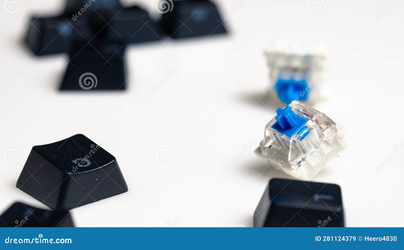 Blue Keyswitch with Scattered Keycaps for Keyboard on White Background ...