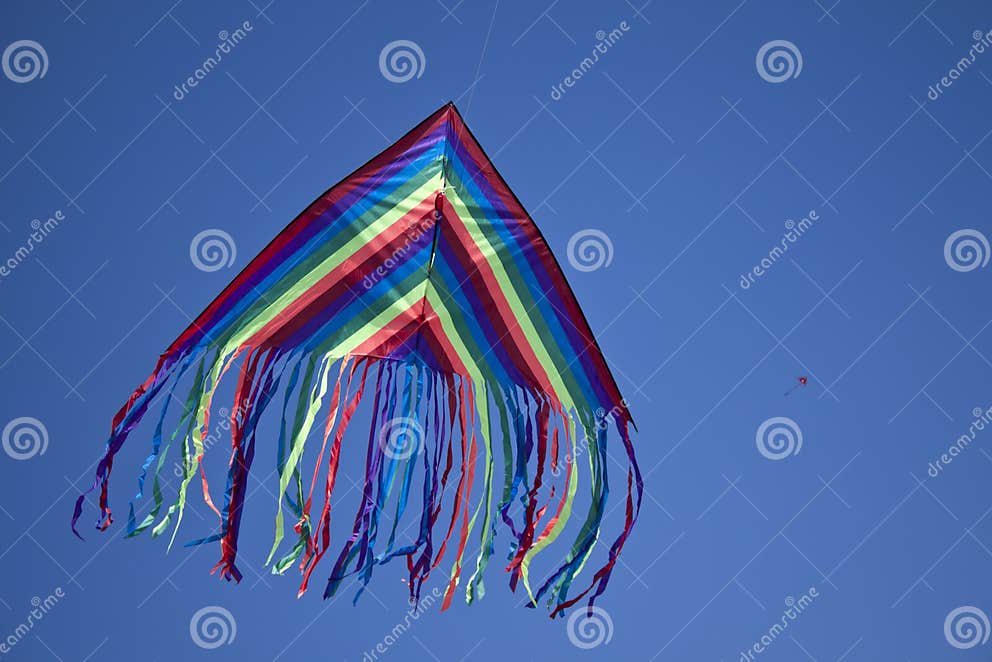 Blue kite in blue sky stock photo. Image of colourful - 21918560