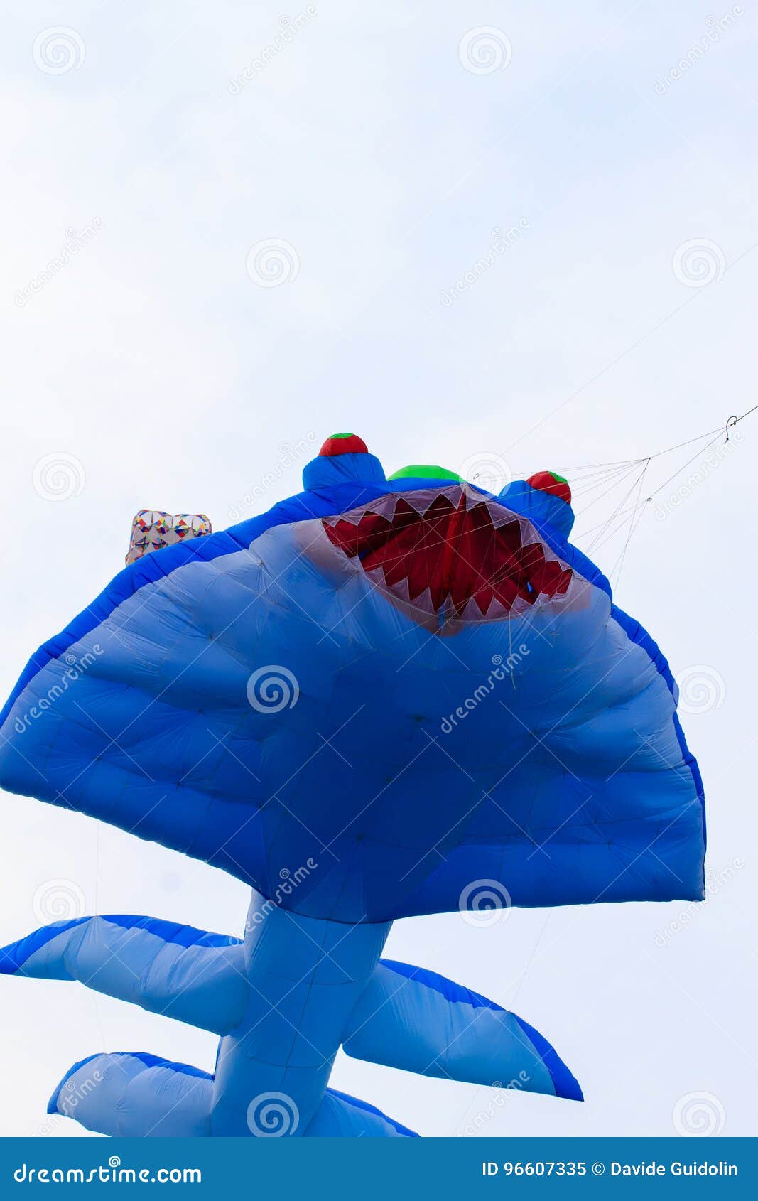 Blue kite that is flying stock image. Image of kite, lisp - 96607335