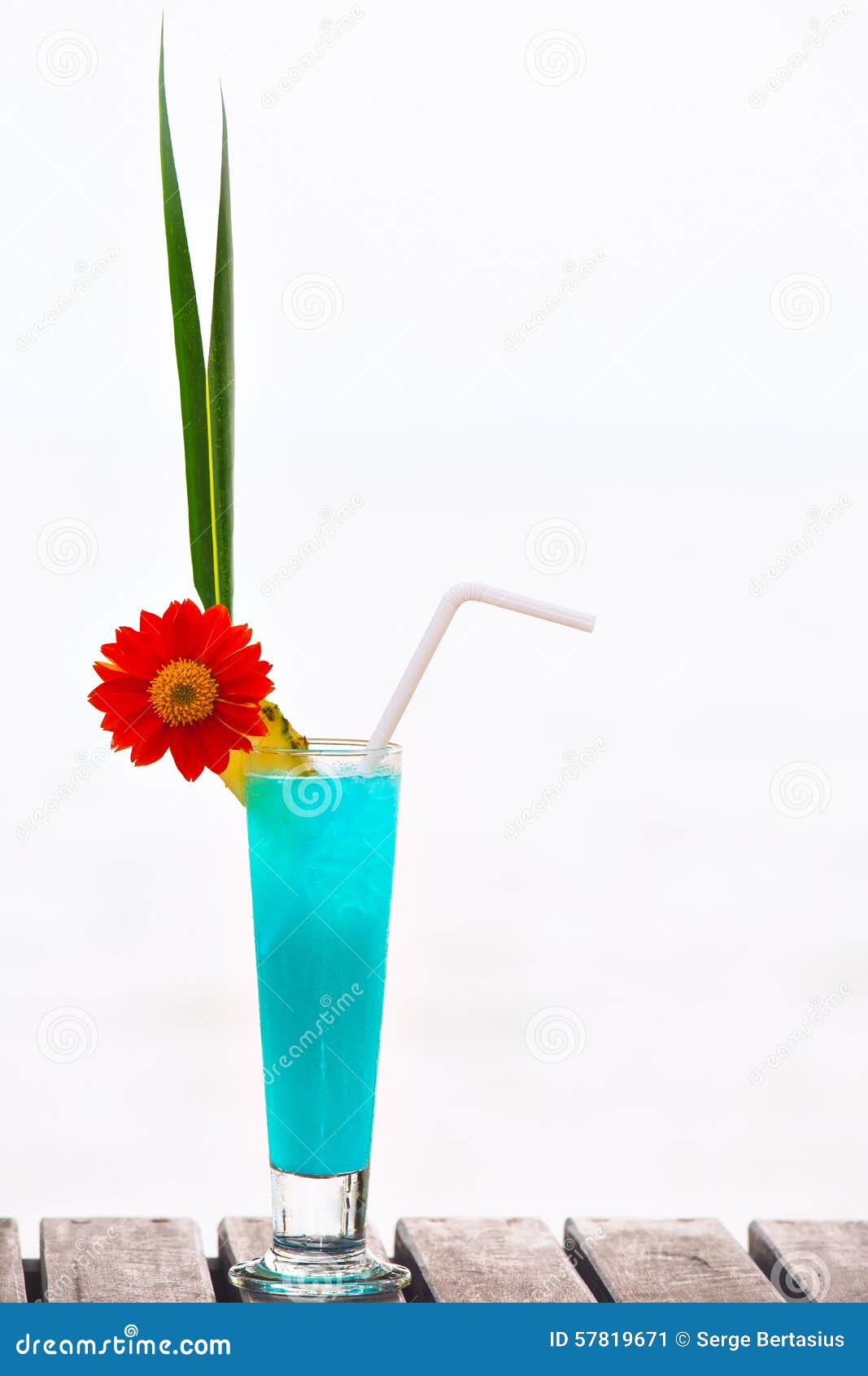 Blue Lagoon Cocktail on the Table at Tropical Beach Stock Image - Image ...