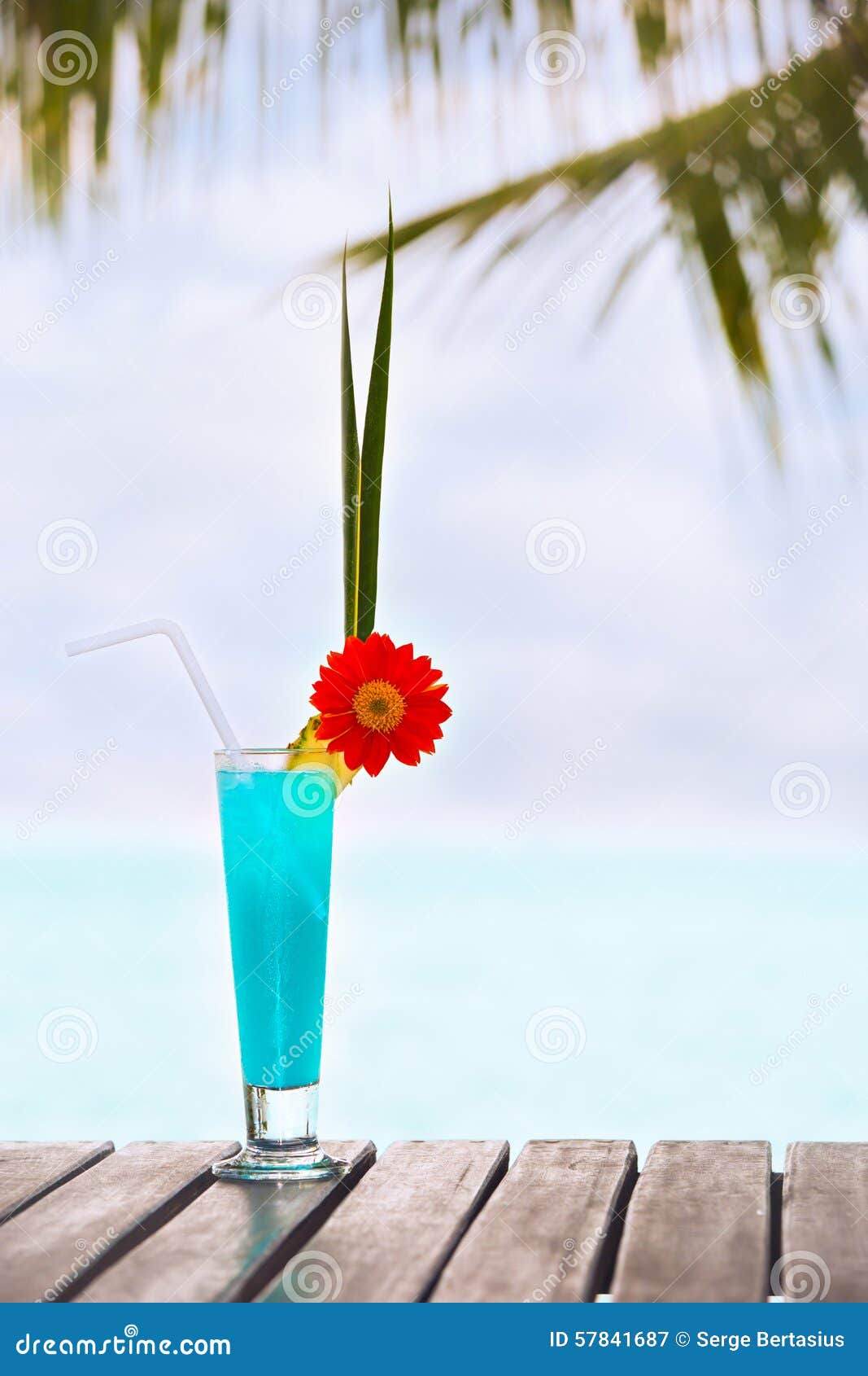 Blue Lagoon Cocktail on the Table at Tropical Beach Stock Image - Image ...