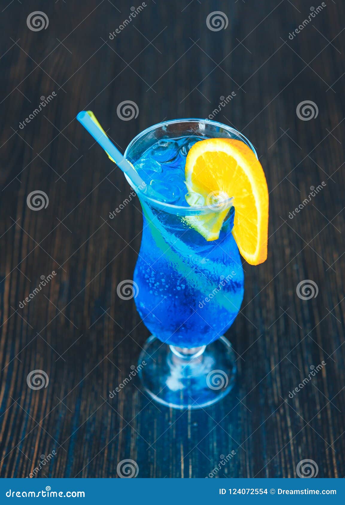 Blue Lagoon Cocktail on a Wooden Table Stock Photo - Image of shot ...