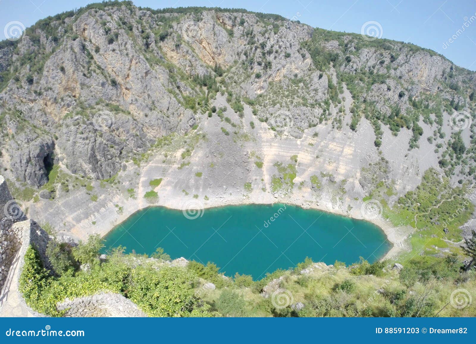 Blue Lake in the Crater of an Extinct Volcano in Croatia.. Stock Image ...