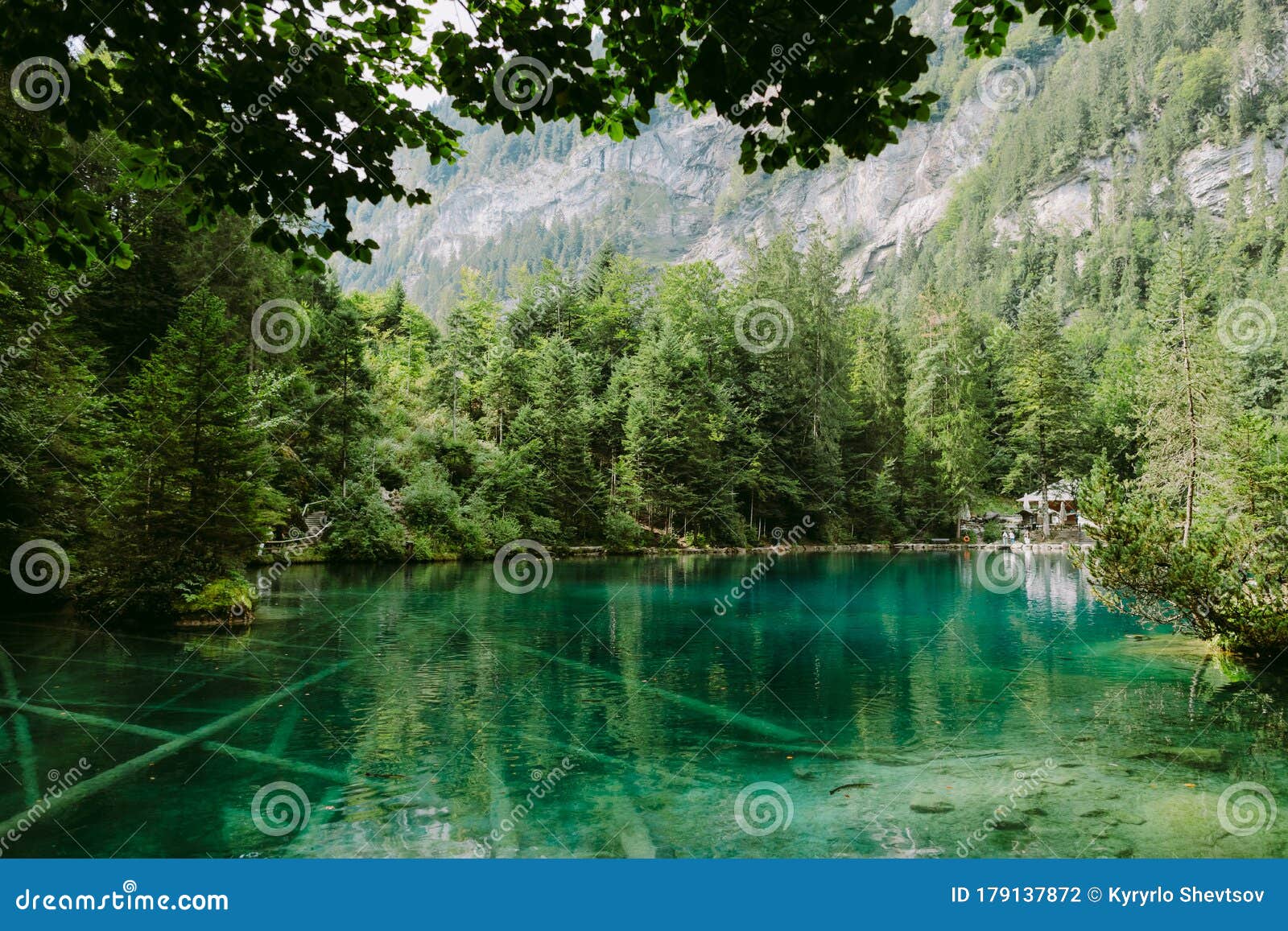 Blue lake in switzerland stock photo. Image of europe - 179137872