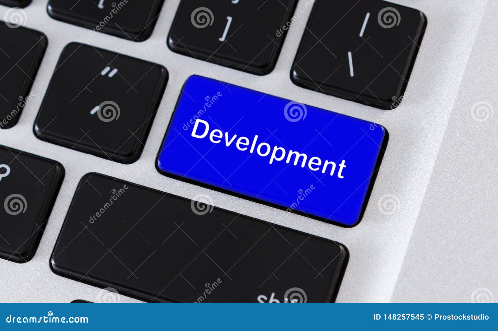 Blue Laptop Keyboard Button with Word Development Stock Image - Image ...