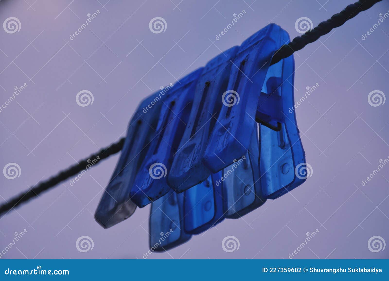 Blue Laundry Clothes in Rain . Stock Photo - Image of screenshot ...