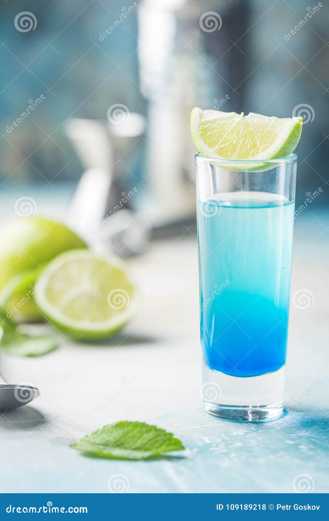 A Blue Layer Alcoholic Cocktail Stock Photo - Image of food, orange ...