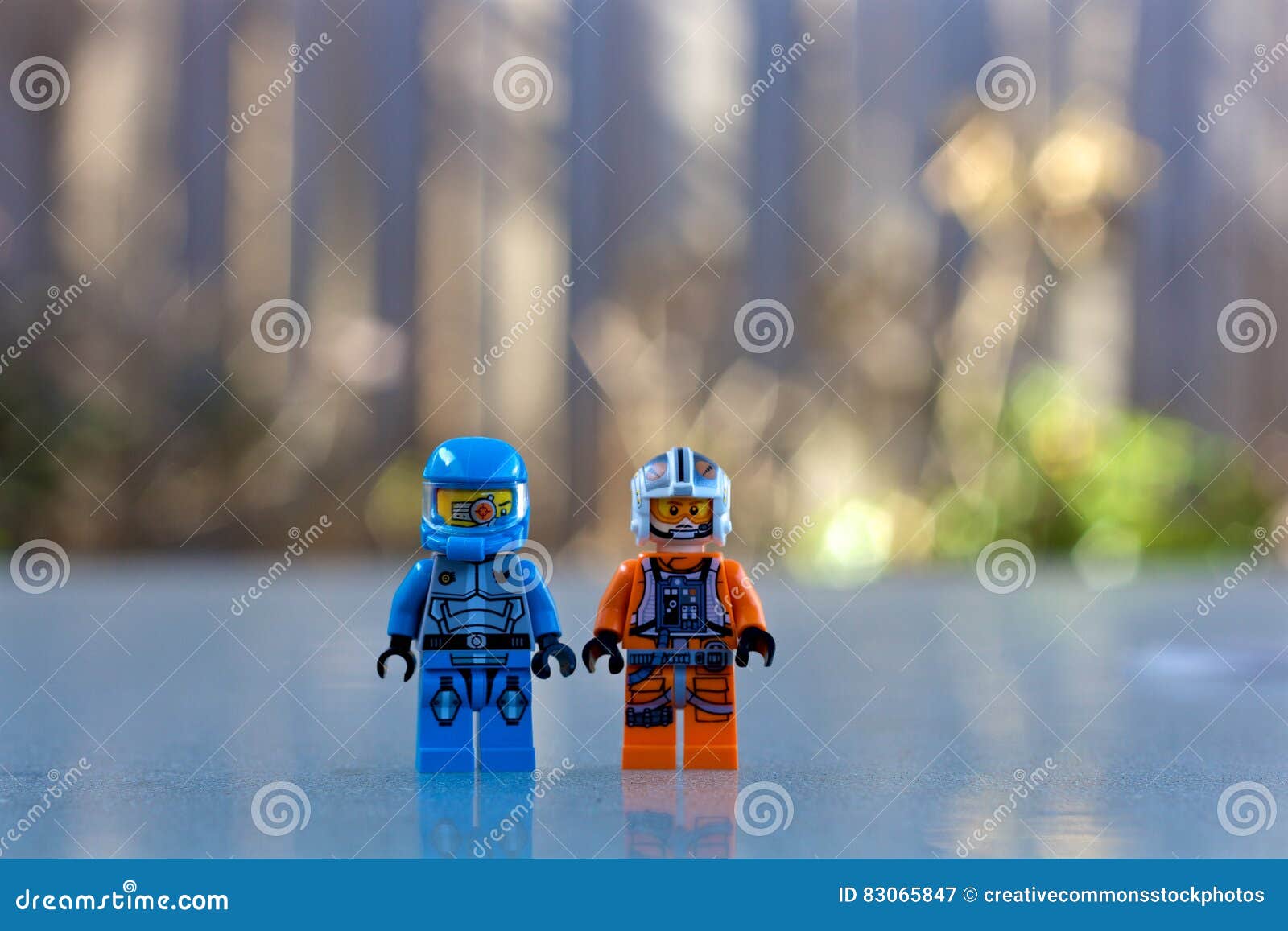 Blue Lego Toy Beside Orange And White Lego Toy Standing During Daytime ...