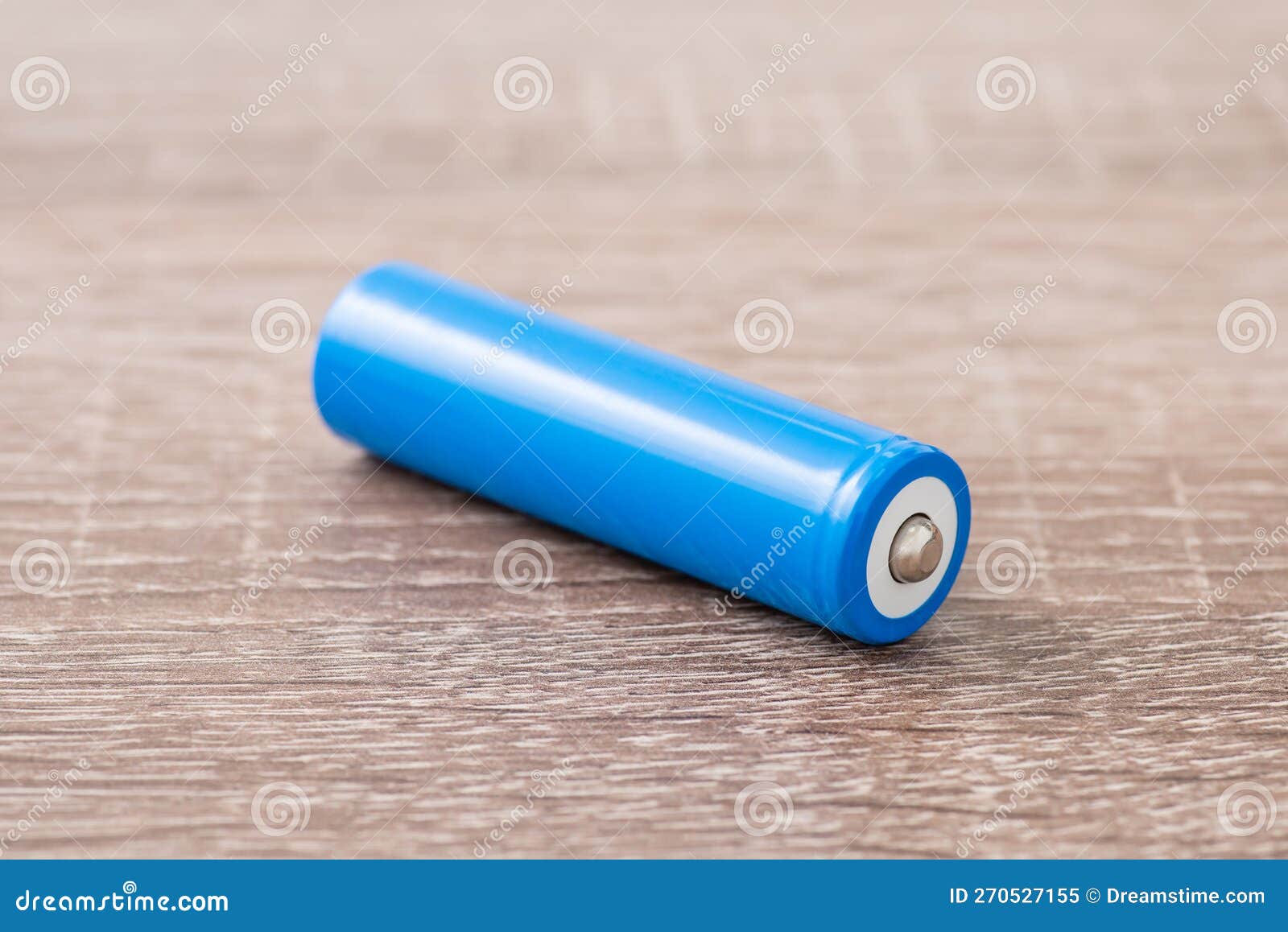 Blue Li-ion Battery on Wooden Table Stock Image - Image of lithium ...