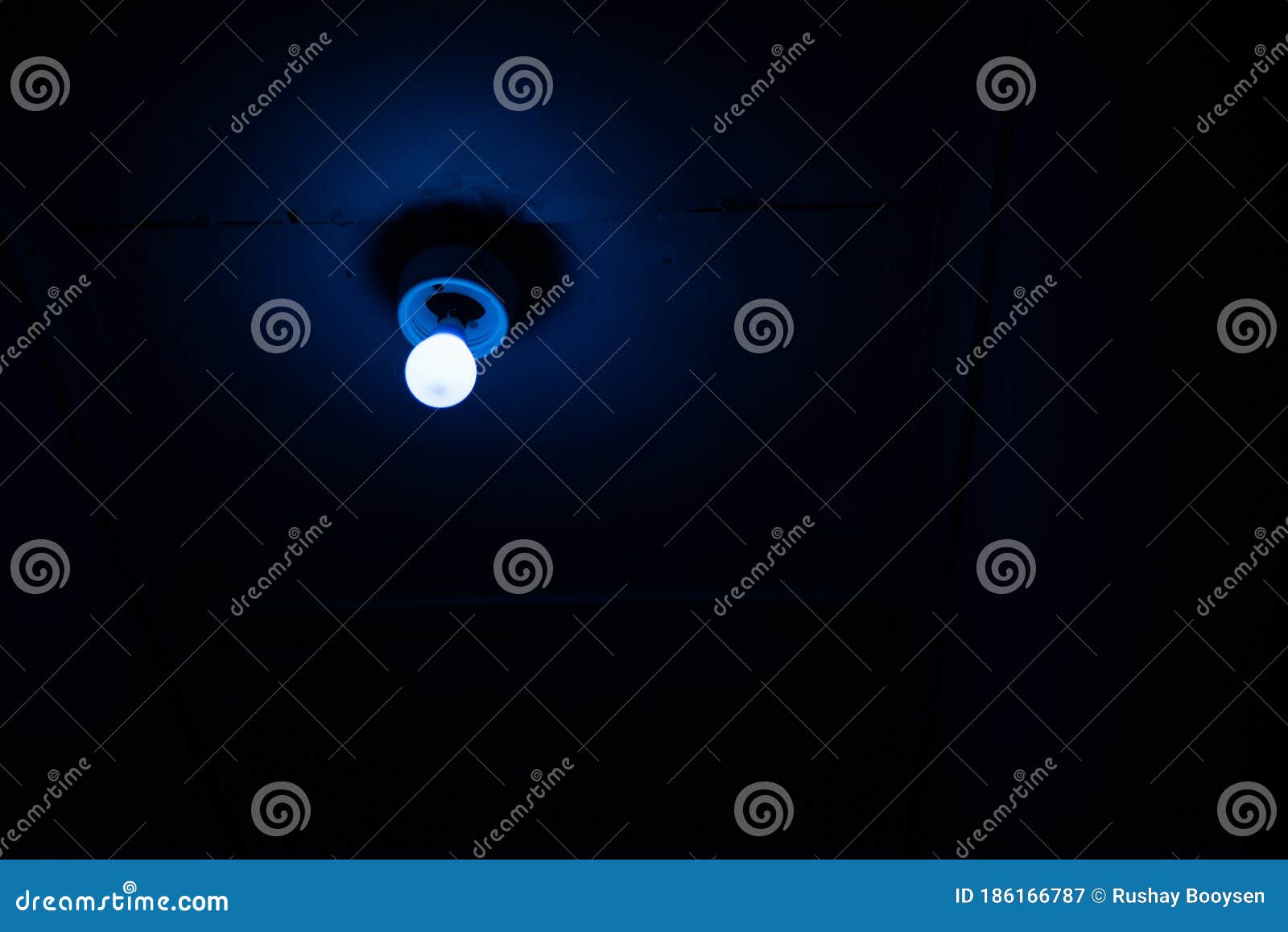 Blue Light Shining in Dark Room Stock Image - Image of shiny, energy ...