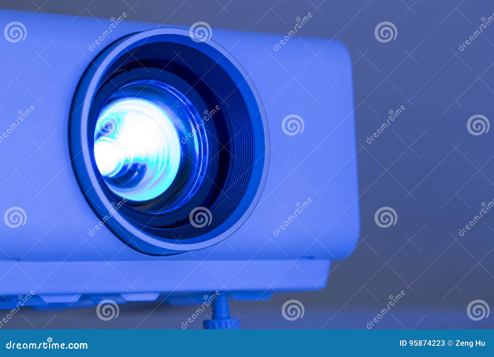 Blue light data projector. stock image. Image of computer - 95874223