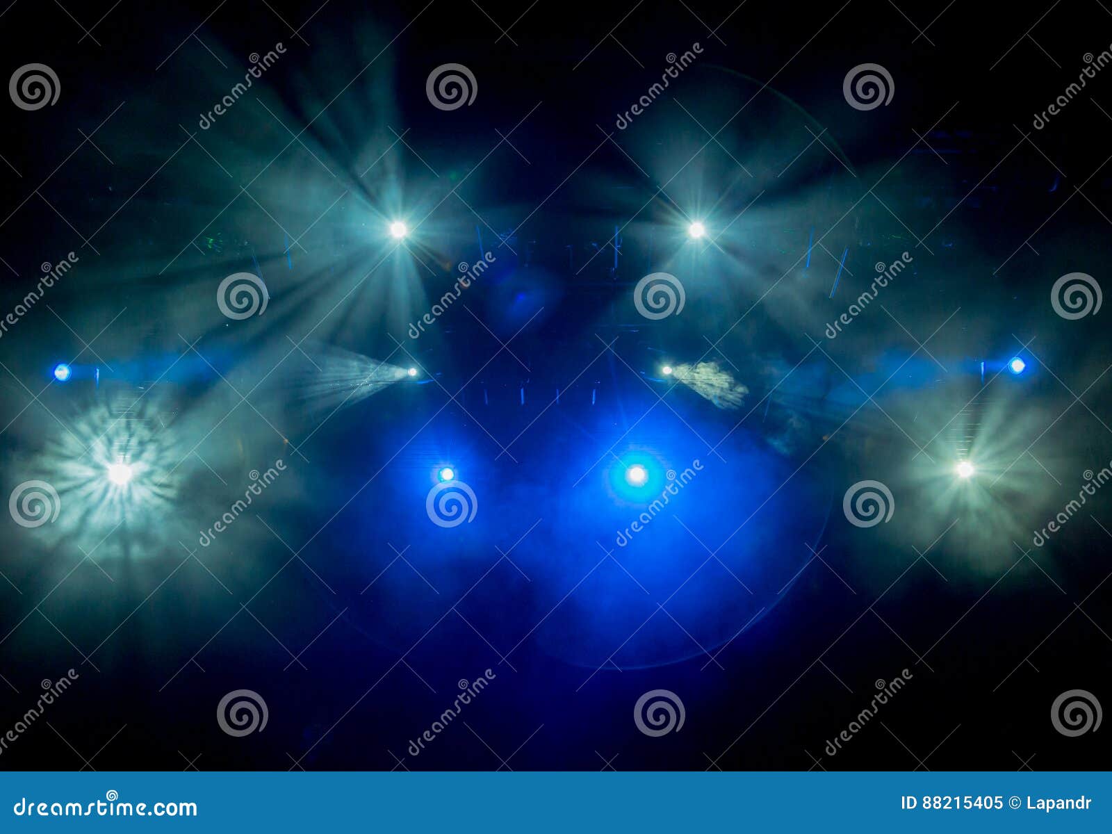 The Blue Light from the Spotlights through the Smoke in the Theatre ...