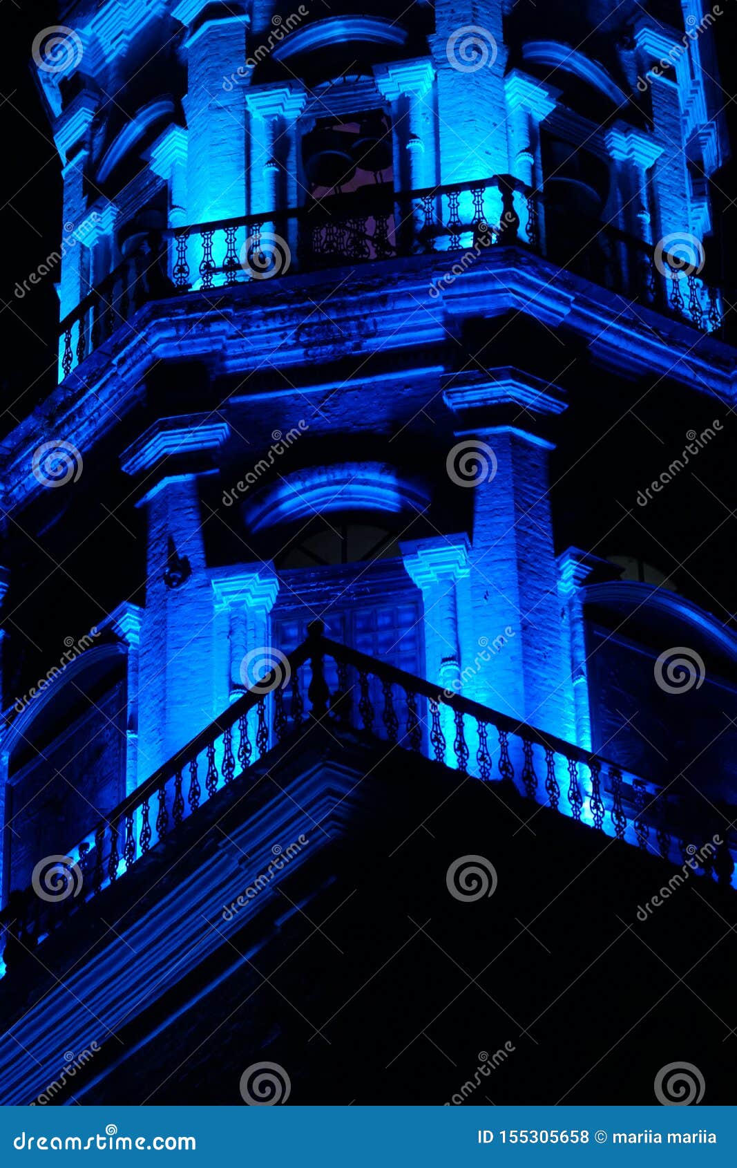 The Blue Light on the Tower Landmark Stock Photo - Image of clouds ...