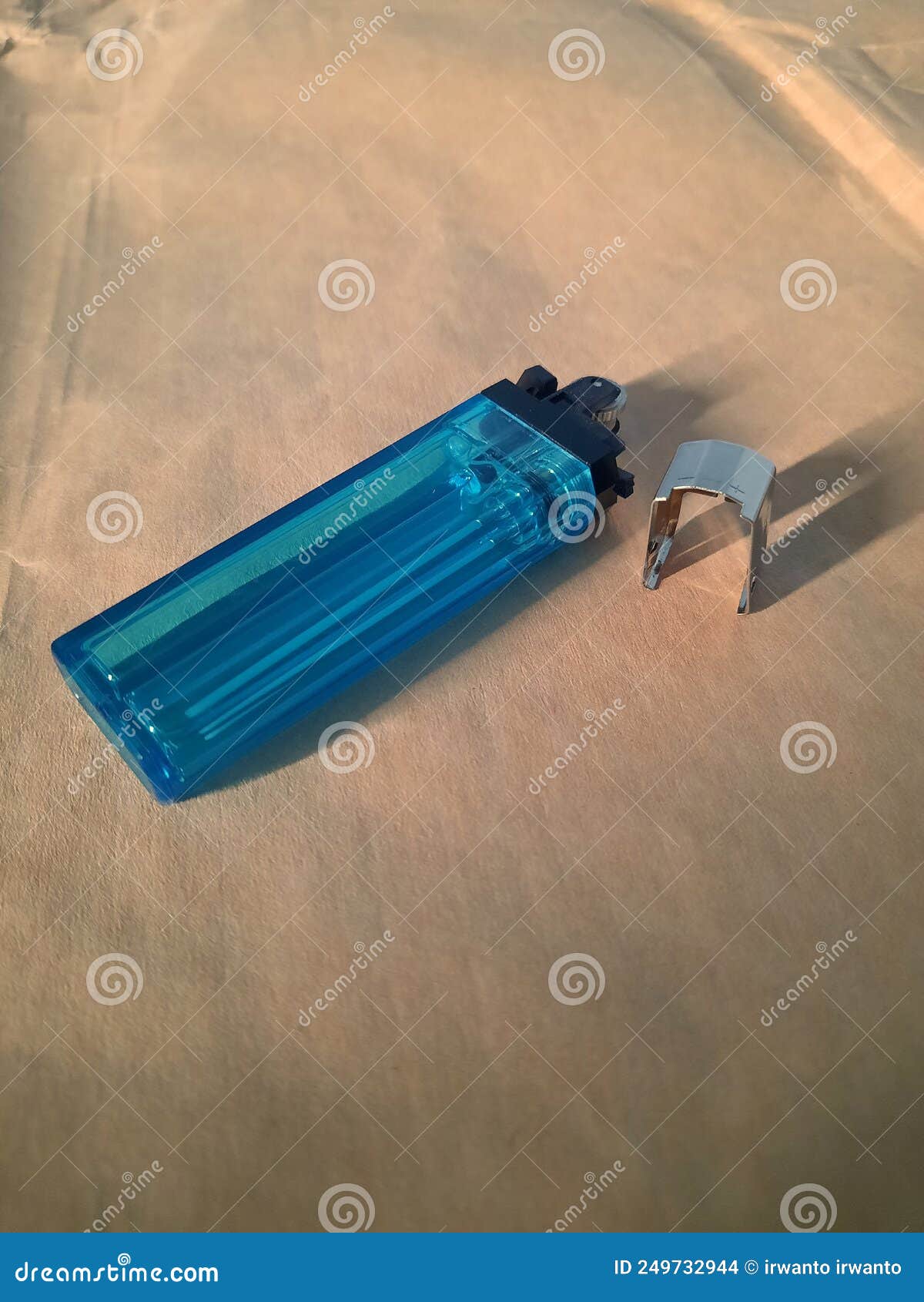 Blue Lighter on the Brown Background Stock Photo - Image of disposable ...