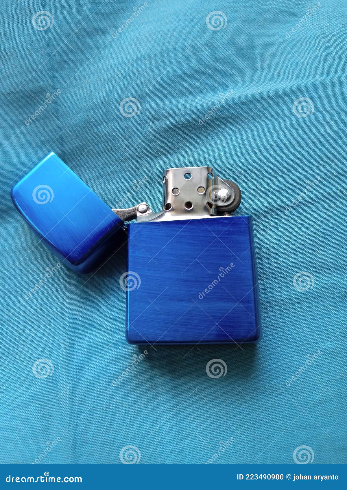 Blue Lighter on Light Blue Surface Stock Photo - Image of light, fire ...
