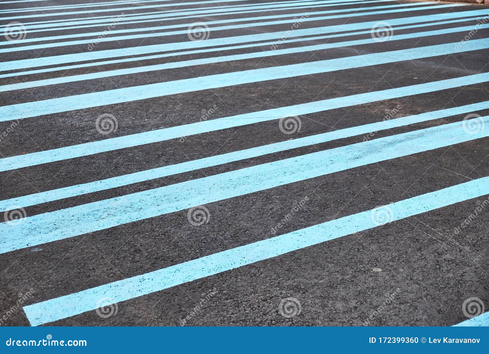 Blue Lines on the Asphalt Road. Stock Photo - Image of urban ...
