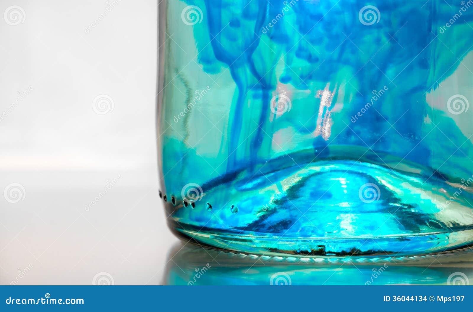 Blue liquid in a bottle stock photo. Image of spreading - 36044134