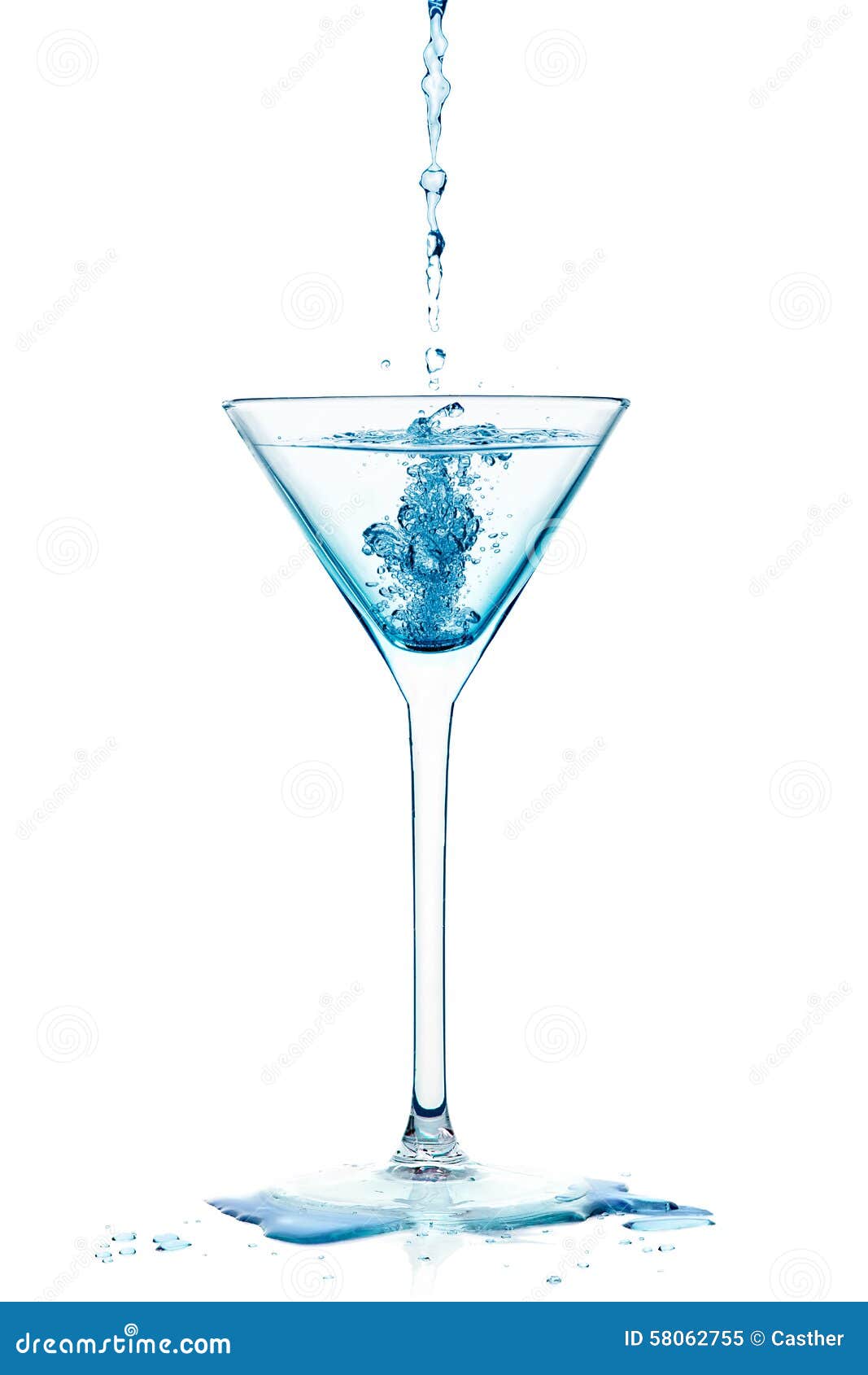 Blue Liquid Falling into a Cocktail Glass of Dry Martini Isolate Stock ...