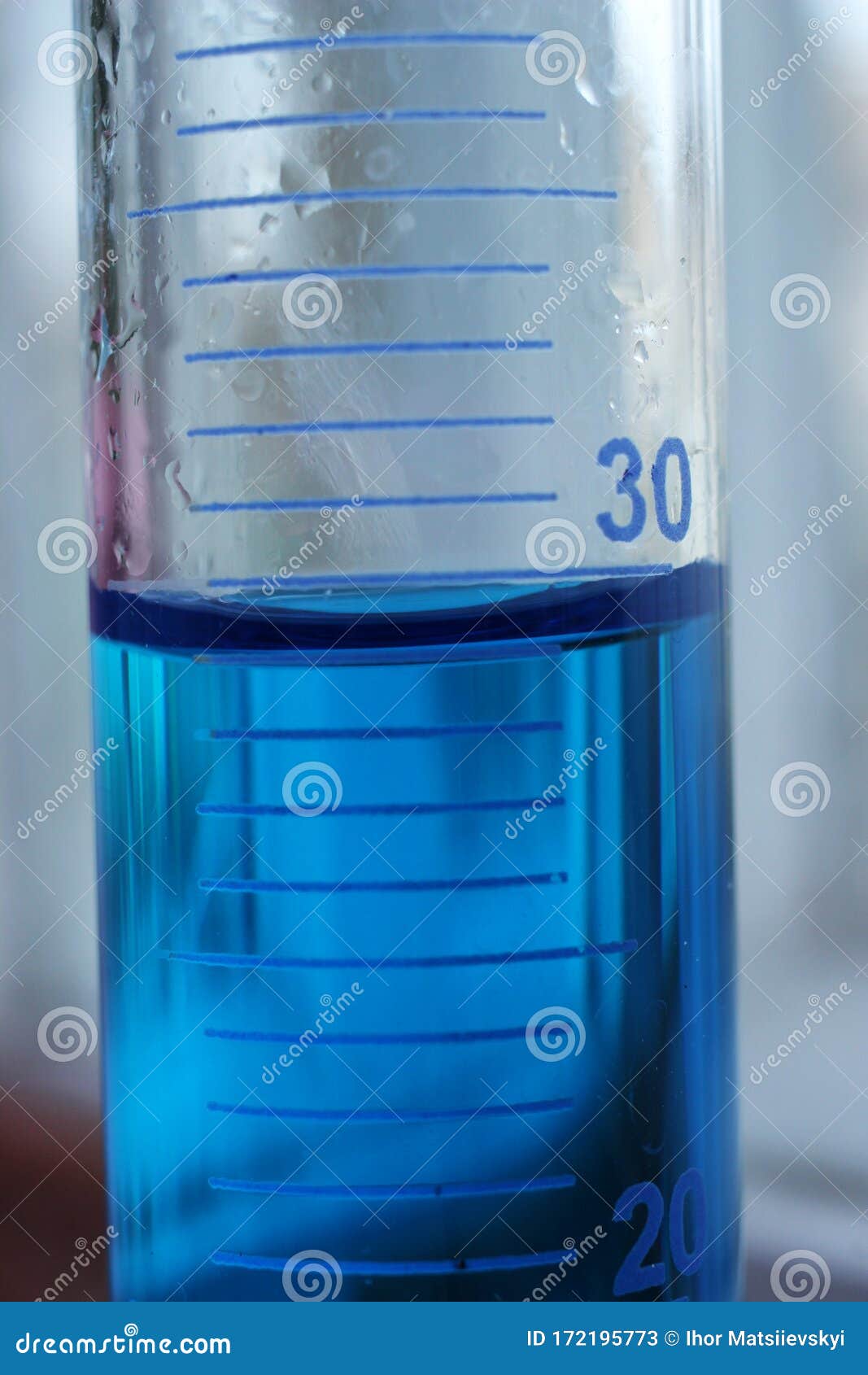 Measuring Cylinder with Blue Substance. Stock Image - Image of color ...