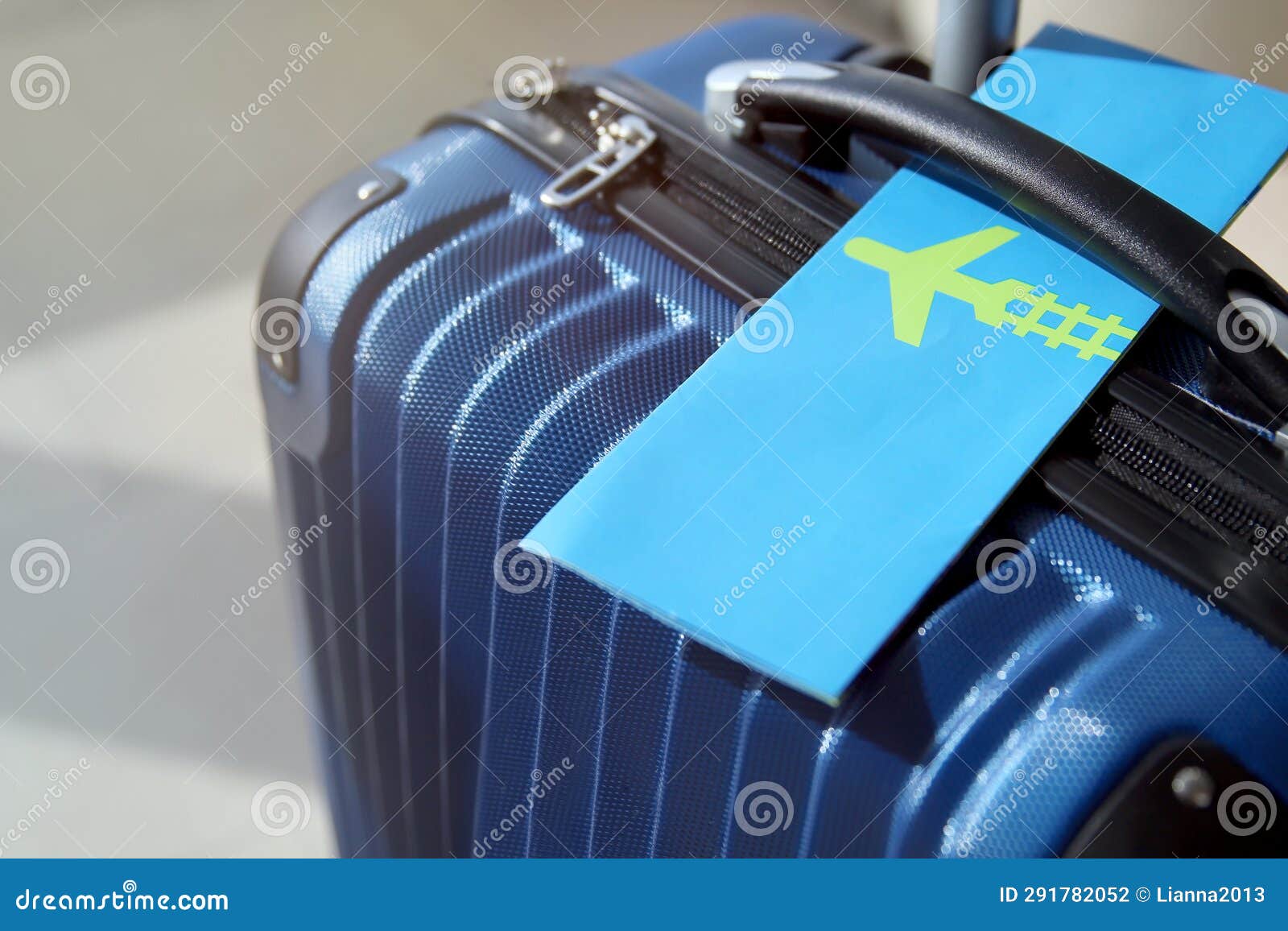 Blue Luggage with Ticket is Standing at the Airport Stock Photo - Image ...