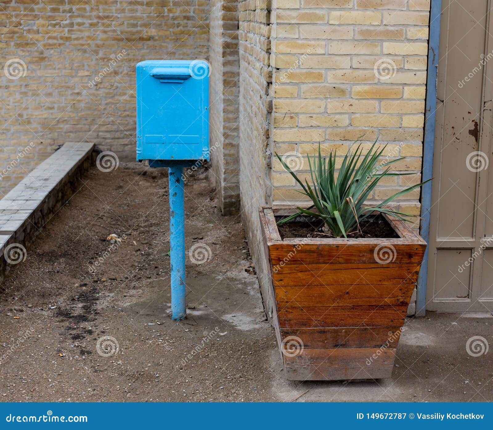 Blue Mailbox in Brisbane Australia with Hole Cut in Fence for ...