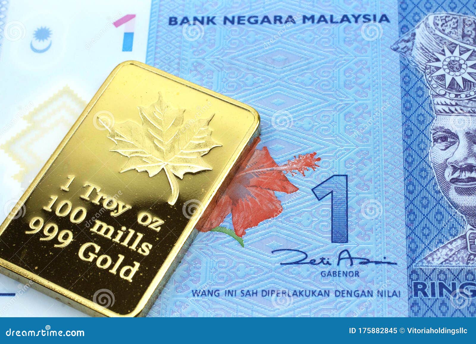 A Blue Malaysian One Ringgit Note with a Gold Bar in Macro Stock Image ...