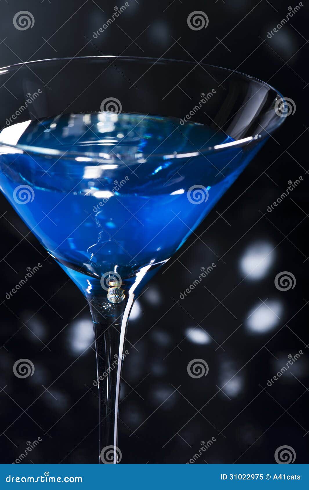 Blue Martini cocktail stock image. Image of liquor, glass - 31022975